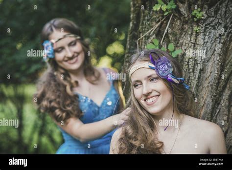 Two Babes Twins From Near Tree In Summer Stock Photo Alamy