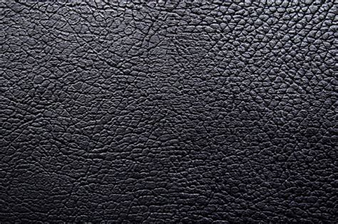 검은 가죽 질감 배경 프리미엄 사진
