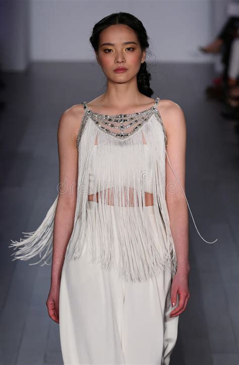 A Model Walks Runway At Hayley Paige Fashion Show During Fall 2015
