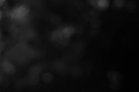 어두운 흐린 크리스마스 조명 배경 디자인 효과 포커스 해피 홀리데이 파티 글로우 텍스처 블랙 벽지 보케 태양 햇볕이 잘 드는 별 빛나는 부드러운 평신도 따뜻한 플레어 흐림