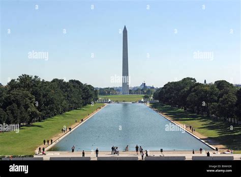 The Reflecting Pool At The National Mall With The Washington Monument