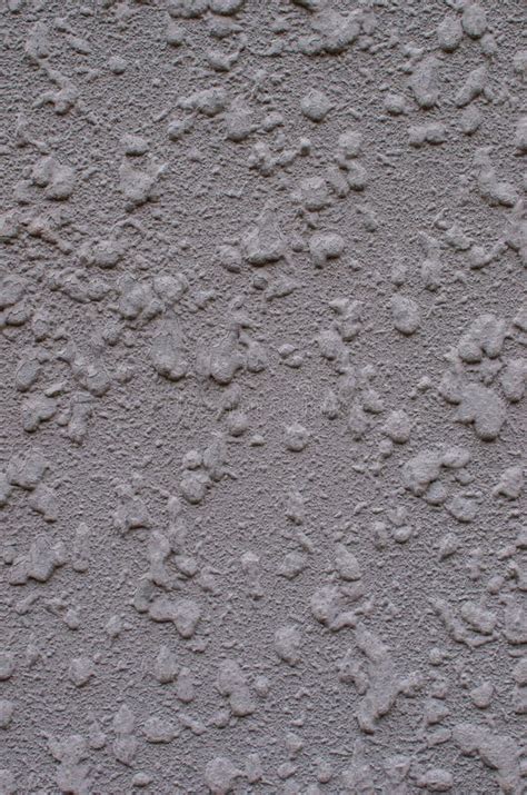Background Texture Of A Modern Plastered Facade Of A Residential