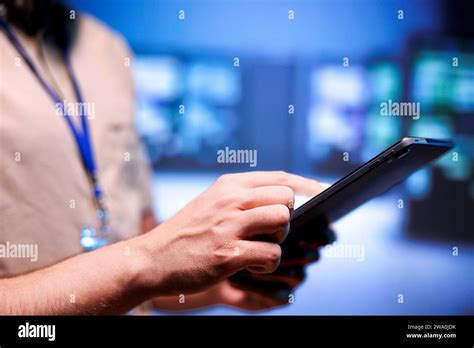Admin Checking Interlinked Computers Creating Server Network Close Up Supercomputers In Blurry