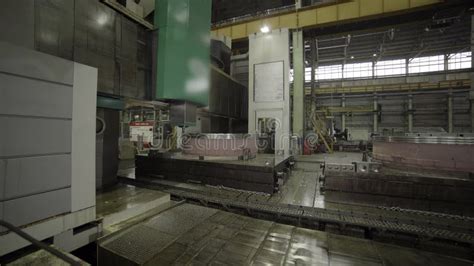 Observe The Industrial Cnc Machining Center Performing Its Functions In