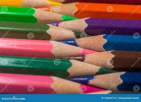 Unity And Diversity Still Life Conceptual Colored Pencils On Isolated Backround Stock Photo