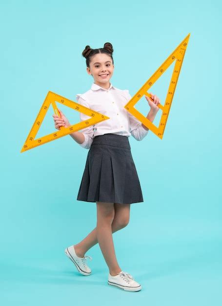 Premium Photo Measuring Babe Equipment Babegirl Holding Measure For Geometry Lesson