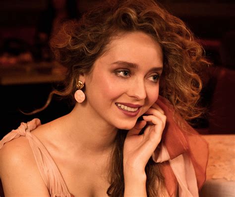 Download Elegant Smiling Woman Peach Dress Wallpaper