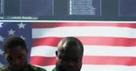 Vertical Video Military Officer In A High Tech Control Center Engages In Cybersecurity