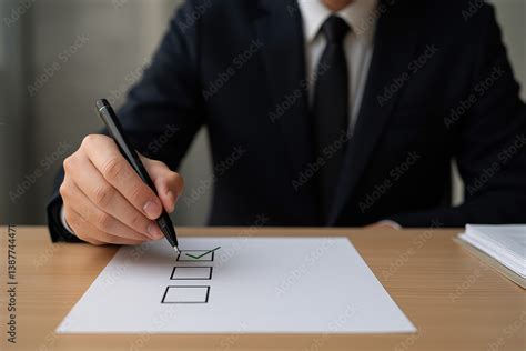 Document Approval Process Checklist With A Professional Man Marking A Checkbox Signifying