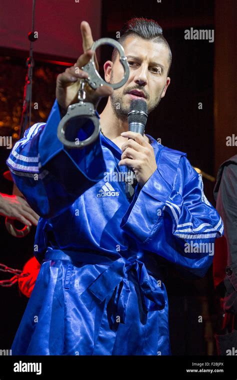 Andrew Basso Performs A Houdini Style Escape From A Water Tank Press