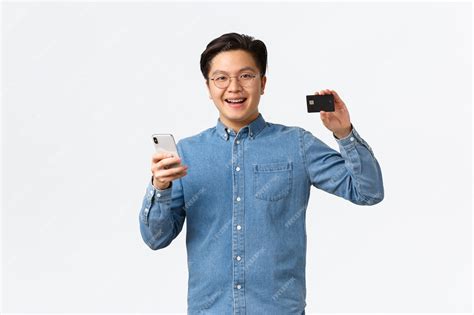 Premium Photo Smiling Happy Asian Guy In Glasses And Casual Clothes