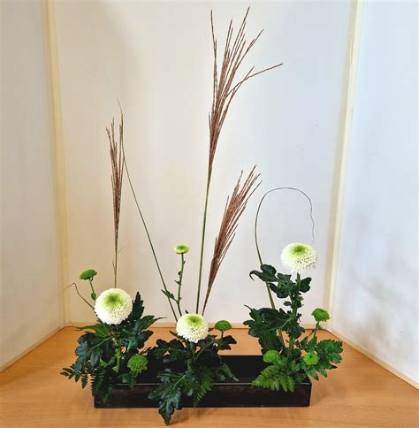 One Row Form Hana Isho With Silvergrass Chrysanthemums And Ferns Rikebana