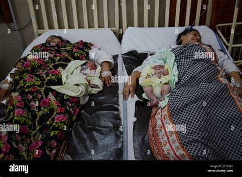 Pakistani Mothers With Their New Born Infants At Local Hospital On The