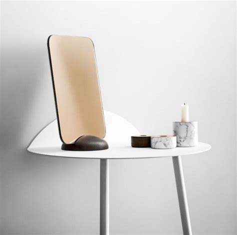 Clever Round Table Features An Upturned Wall Hugging Edge Designs