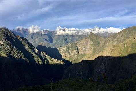 Salkantay Trek Day 3 Peruvian Starbucks And Distant Machu Picchu Into