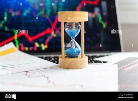 Businessman Looking At A Giant Hourglass Digital Illustration Stock