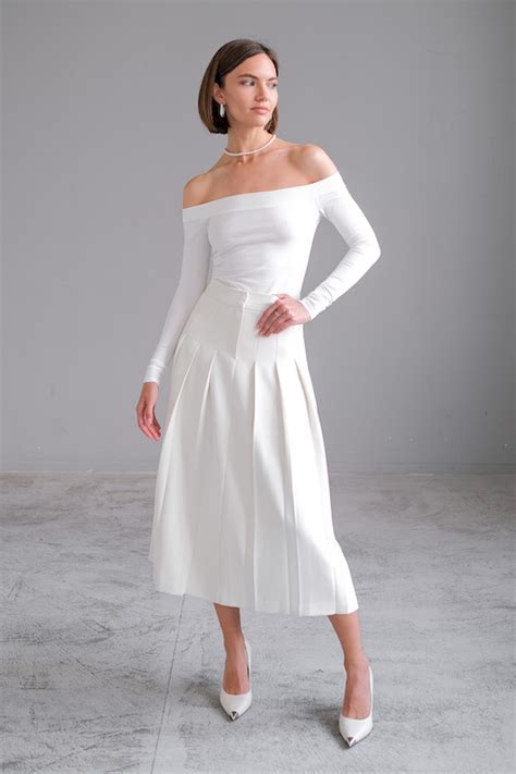 Юбка в складку молочная