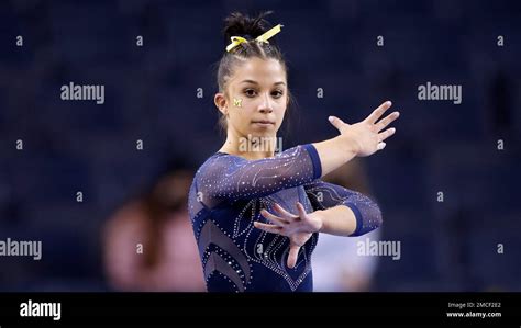 Michigans Reyna Guggino Performs On The Beam During An Ncaa Gymnastics