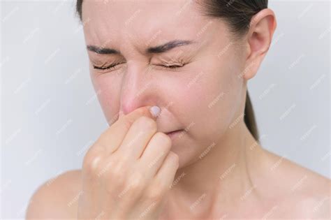Premium Photo Woman With Her Eyes Closed Sneezes Suffers From A Runny