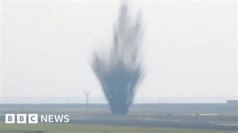 Hidden Runway Bomb Explodes Just After Plane Takes Off