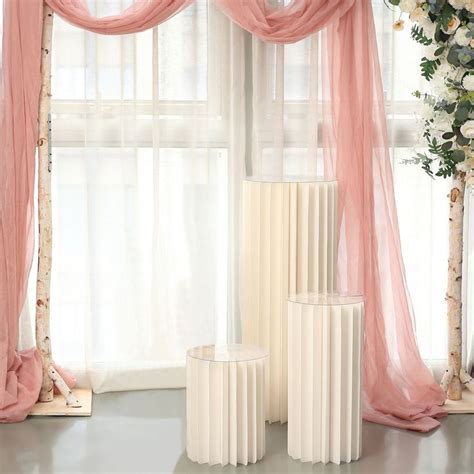 Elegant Wedding Pillars And Pedestals For Cake Display