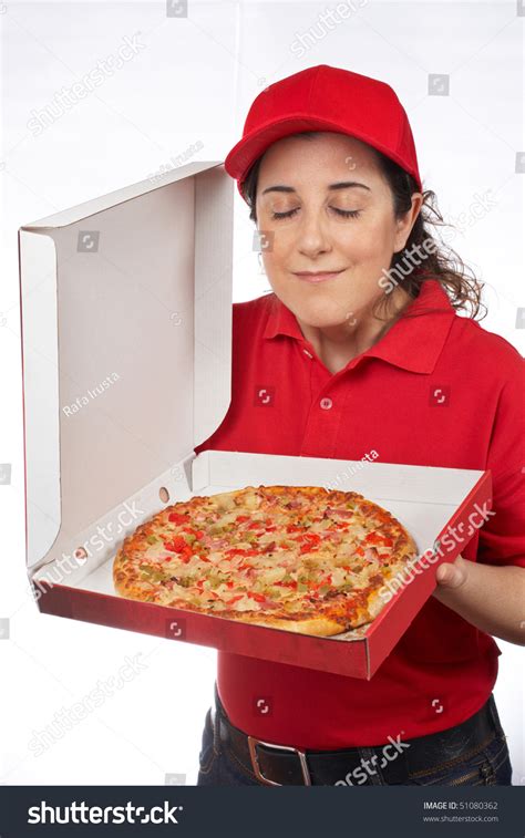 A Pizza Delivery Woman Holding A Hot Pizza Isolated On White Stock