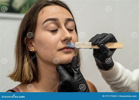 Young Beautiful Girl Came To The Salon To Get Rid Of The Lump Above The Upper Lip Stock Image