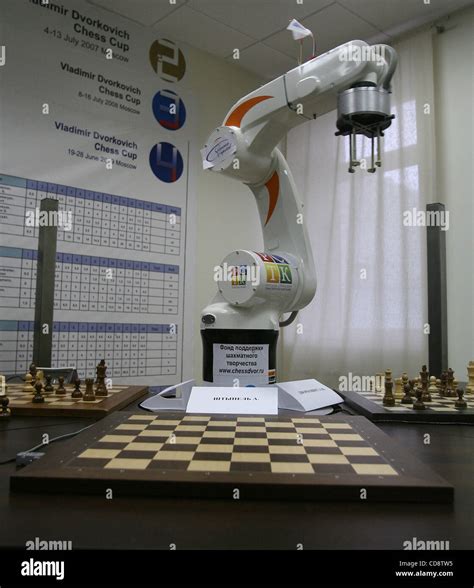Chess Match With A Chess Playing Robot Pictured A Chess Playing Robot That Will Be