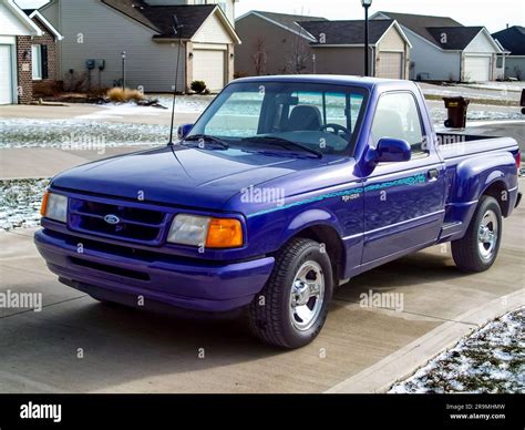 A Purple 1995 Ford Ranger Splash Compact Pickup Truck Parked On A Driveway In A Fort Wayne