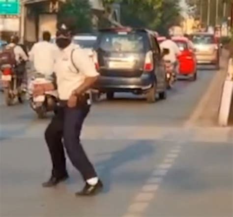 Moonwalking Cop Controls Indian Citys Busy Traffic With His Michael