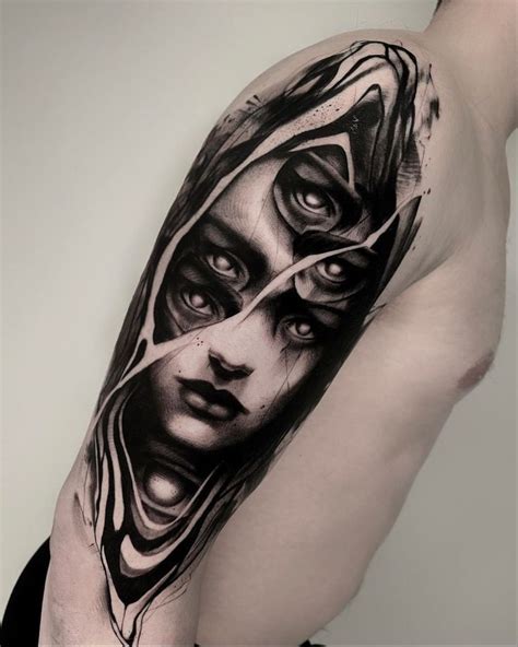 The Dark Mysterious World Of Blackwork Tattoos A Guide To The Most