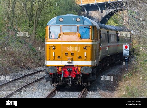 Preserved Class 31 Diesel Number 31190 Hauling A Train Under An Arched