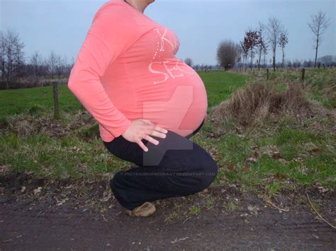 Kneeling With A Very Pregnant Belly By Pretendingpregnant On Deviantart