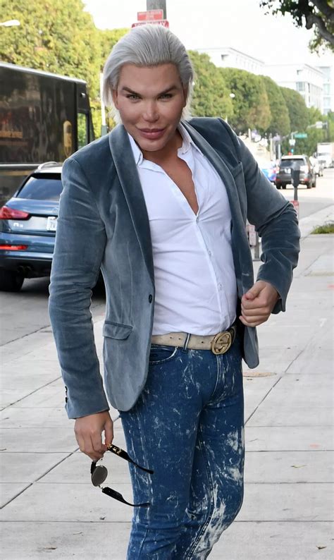 Human Ken Doll Rodrigo Alves Flashes His £22k Fake Abs After Making His