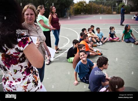 Teachers Check Attendance In School Yard To Make Sure All Pupils Are