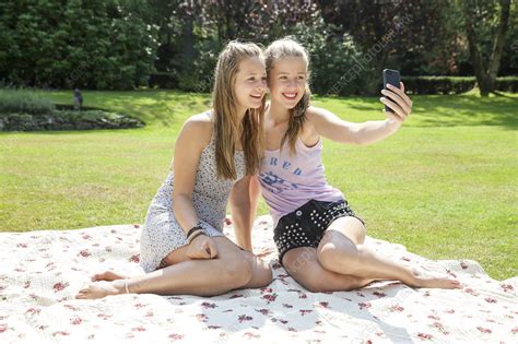 Teenage Girls Taking Self Portrait Stock Image F009 3243 Science