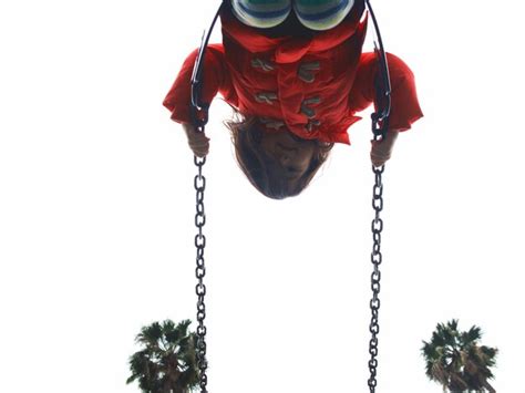 Premium Photo Low Angle View Of Girl On Swing