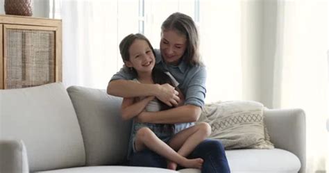 Portrait Of Loving Mother Cuddles Her Cu Stock Video Pond
