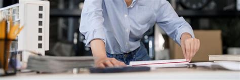 Premium Photo Asian Architect Engineer Women Drawing Layout Of Architecture Plan And Checking