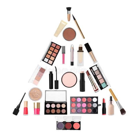 Christmas Tree Shape Made With Different Makeup Products On White Christmas Tree Shape Made With Different Makeup Products On White