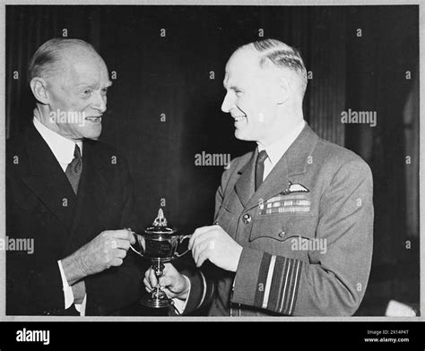 Air Marshal Sir Bertine Sutton Of The Royal Air Force Presents A Gold