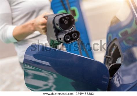Woman Inserting Dc Ccs Ev Charging Stock Photo Shutterstock