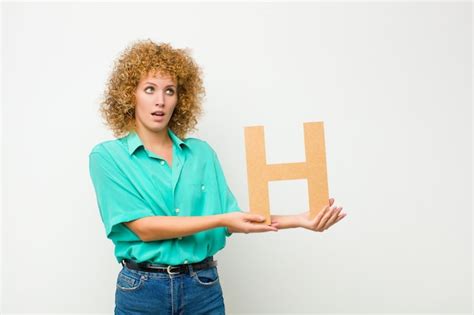 Premium Photo Portrait Of A Woman On A Grey Background