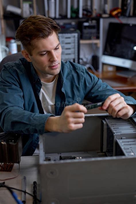 Man Disassembles Broken Computer Computer Service And Repair Concept