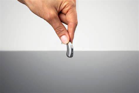 How To Put In Remove And Adjust Hearing Aids Amplifon USA