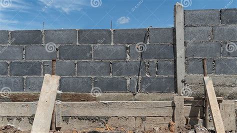 Brick Wall Construction Wooden Partition For The Base Stock Image