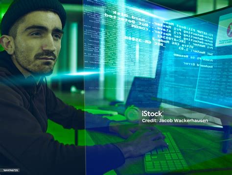 computer hacker programming and man with hologram for phishing scam or cybersecurity software