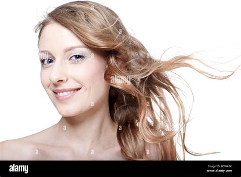Portrait Of Beautiful Girl Model Posing On White And Her Hair Flutter Stock Photo Alamy