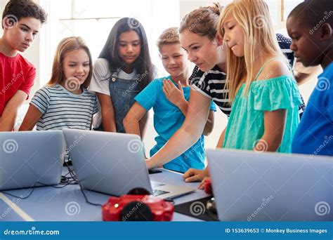 Group Of Students In After School Computer Coding Class Learning To Group Of Students In After School Computer Coding Class Learning To
