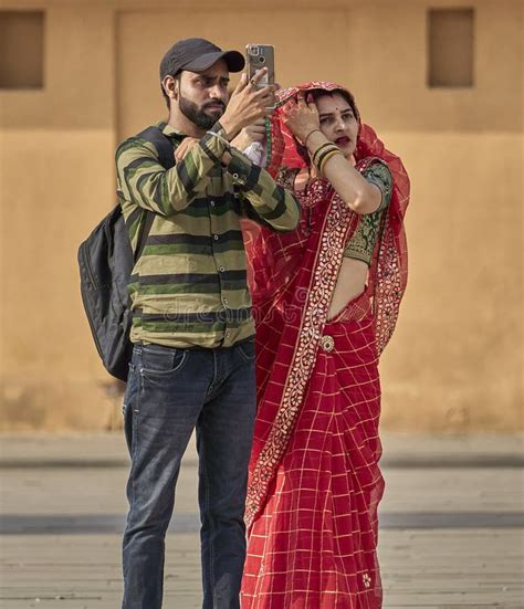 An Indian Couple Are Doing Mobile Photography Editorial Stock Photo Image Of Asian Lady